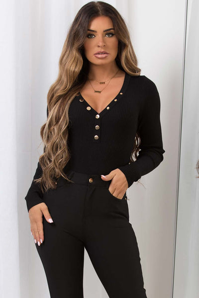 Black Long Sleeve Ribbed Bodysuit With Gold Buttons Going Out Top ...